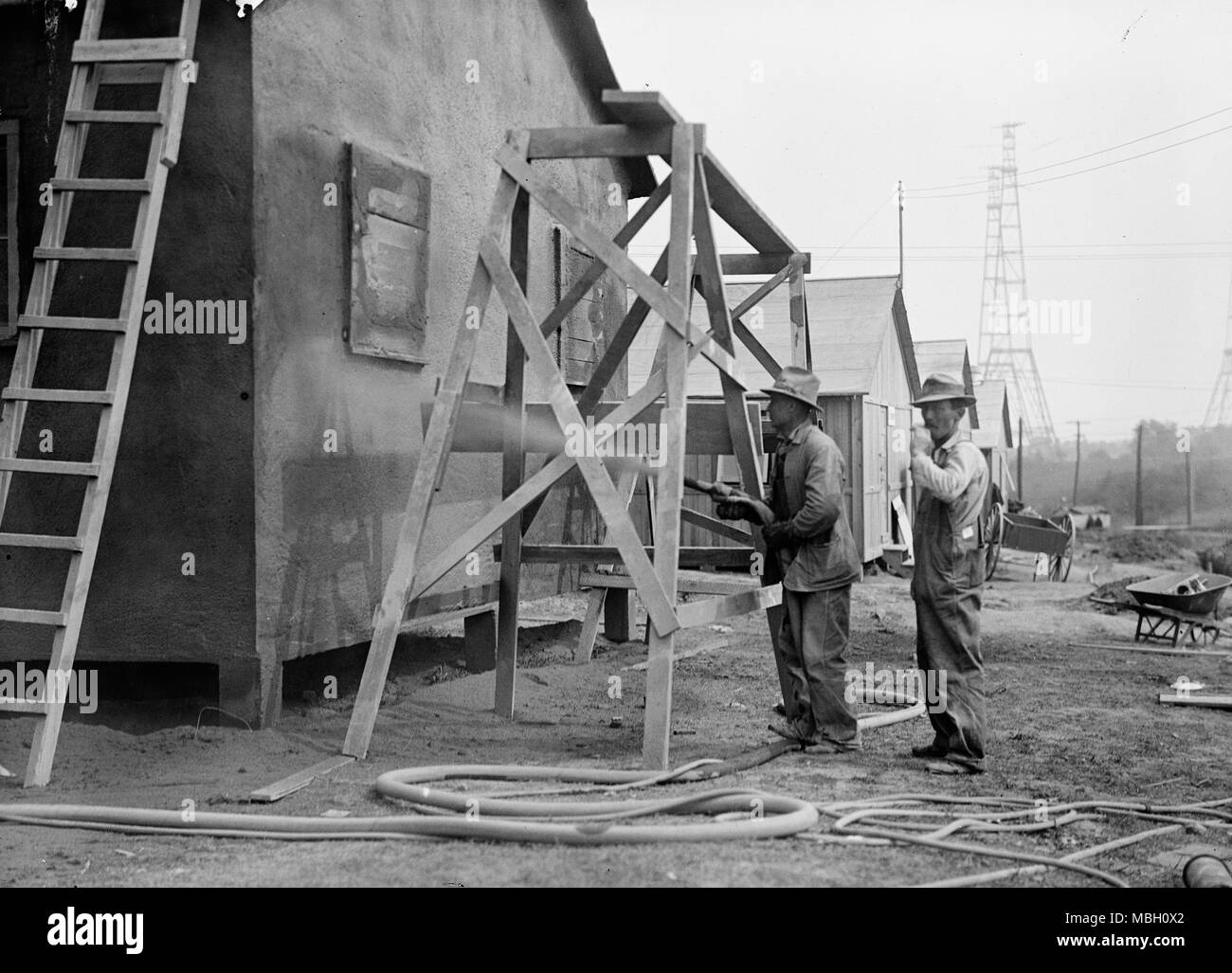 Cement gun Black and White Stock Photos & Images - Alamy
