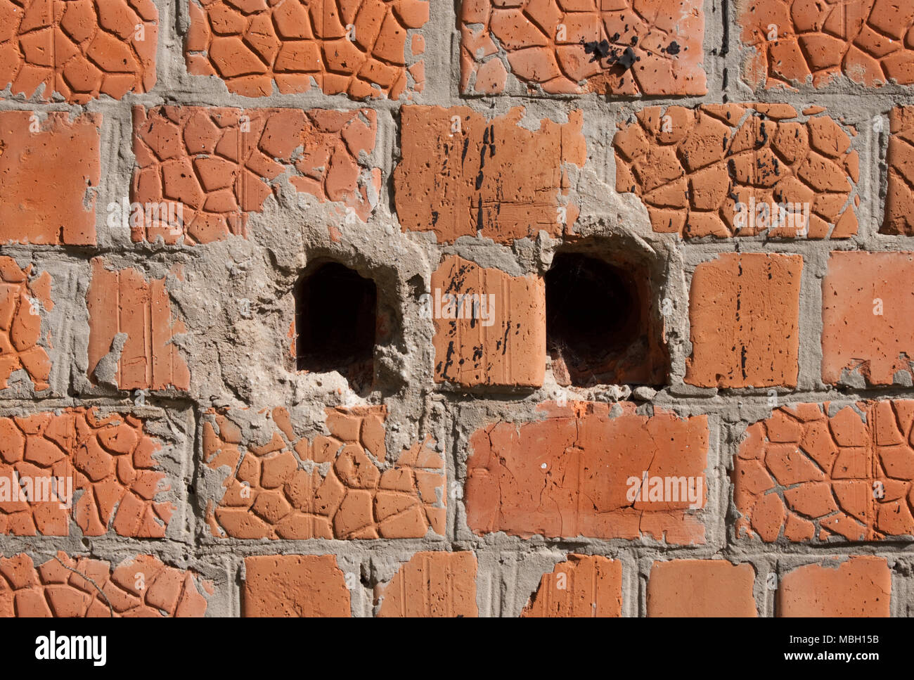 Background from an old brick wall with two apertures Stock Photo - Alamy