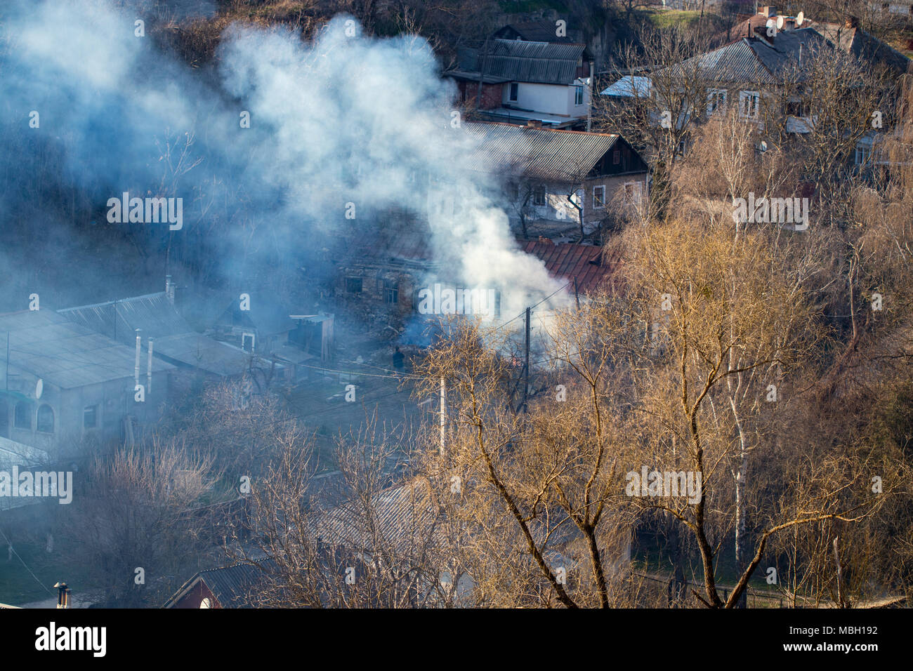 Fire with black smoke in house. House in smoke Stock Photo - Alamy