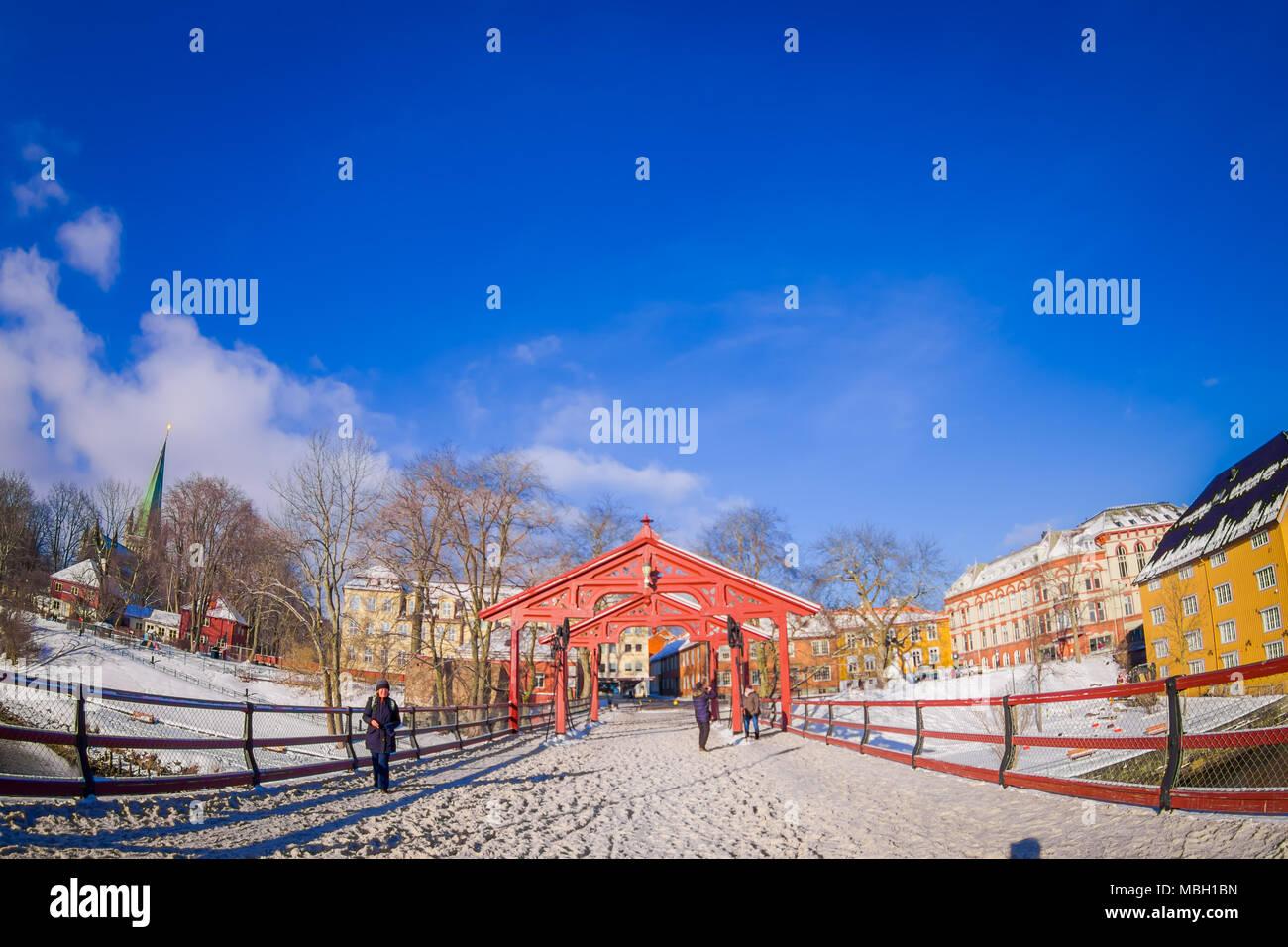 TRONDHEIM, NORWAY - APRIL 04, 2018: Outdoor view of people walking in ...