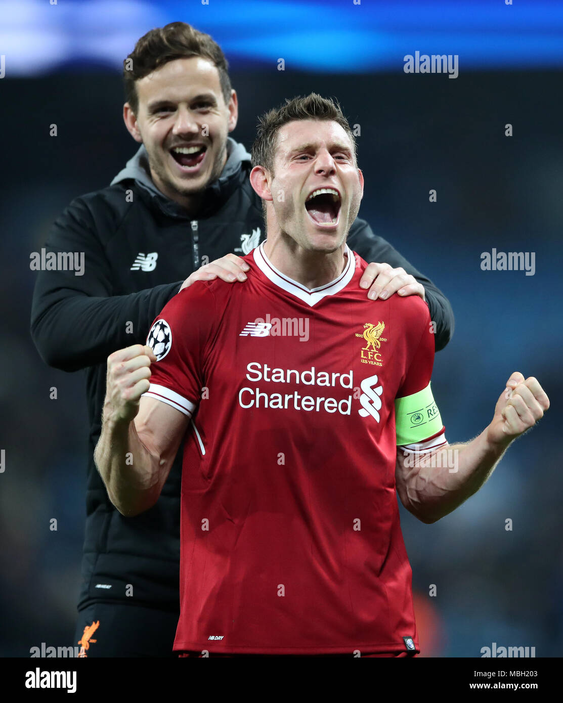 Liverpool's James Milner and Danny Ward celebrate victory after the ...