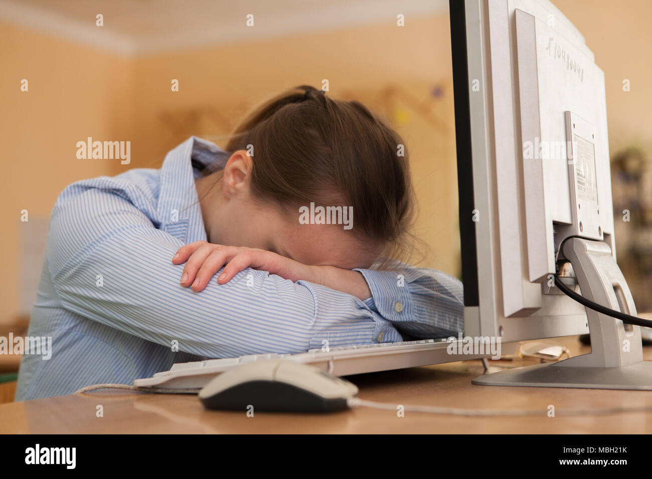 Portrait of tired business woman fell asleep on computer keyboard Stock ...
