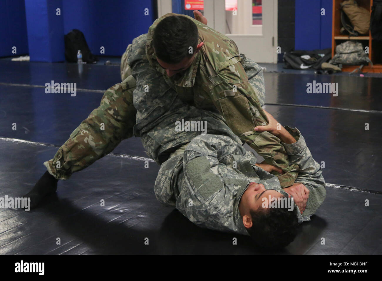 U.S. Army Pv2. Andrew Garcia, (top) assigned to the 55th Signal Company ...