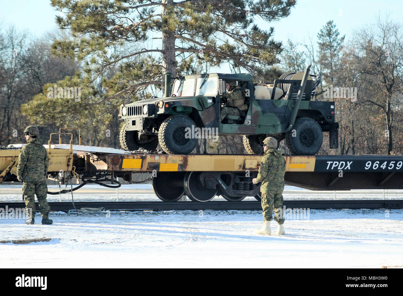 Marines with Marine Wing Support Squadron (MWSS) 271 load equipment on ...