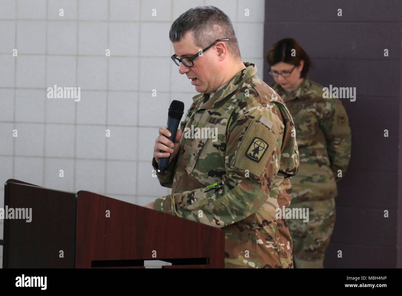 Cpt. Joseph Short gives the invocation at a sendoff ceremony for the ...