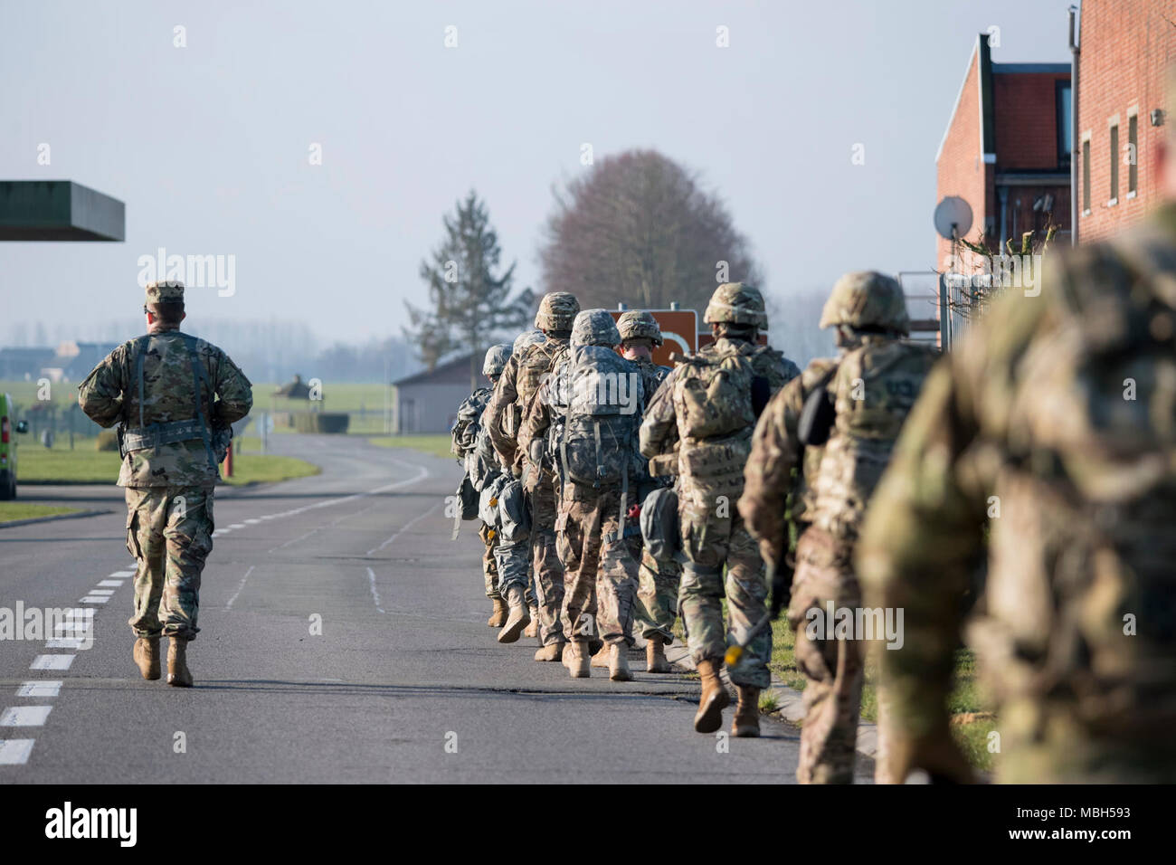 U.S. Army Master Sgt. Christian Stephenson walks alongside Soldiers ...