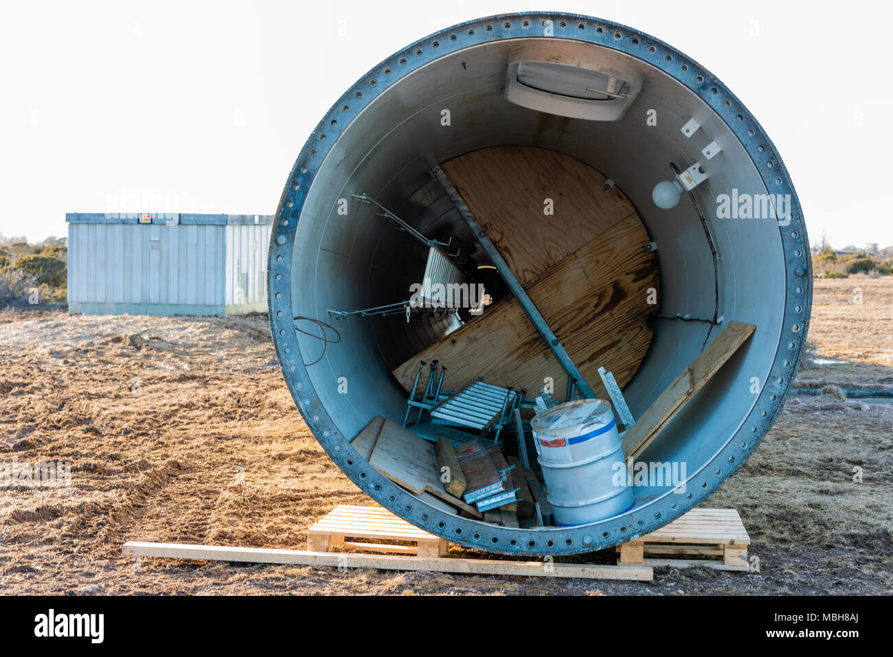 Decommissioned wind turbine tower lying on the ground awaiting ...