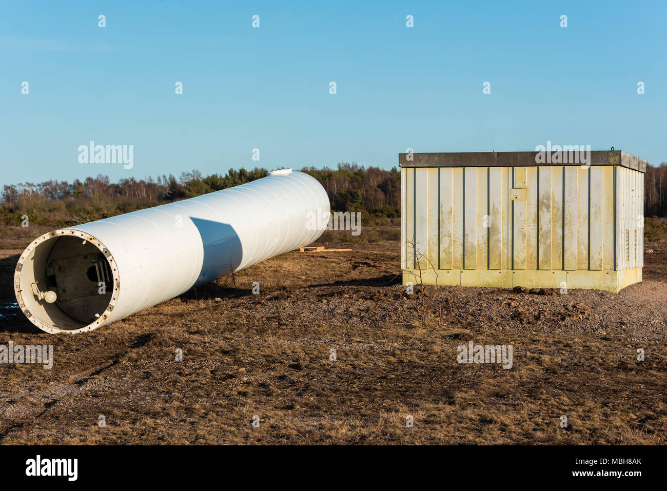 Decommissioned wind turbine tower lying on the ground awaiting ...