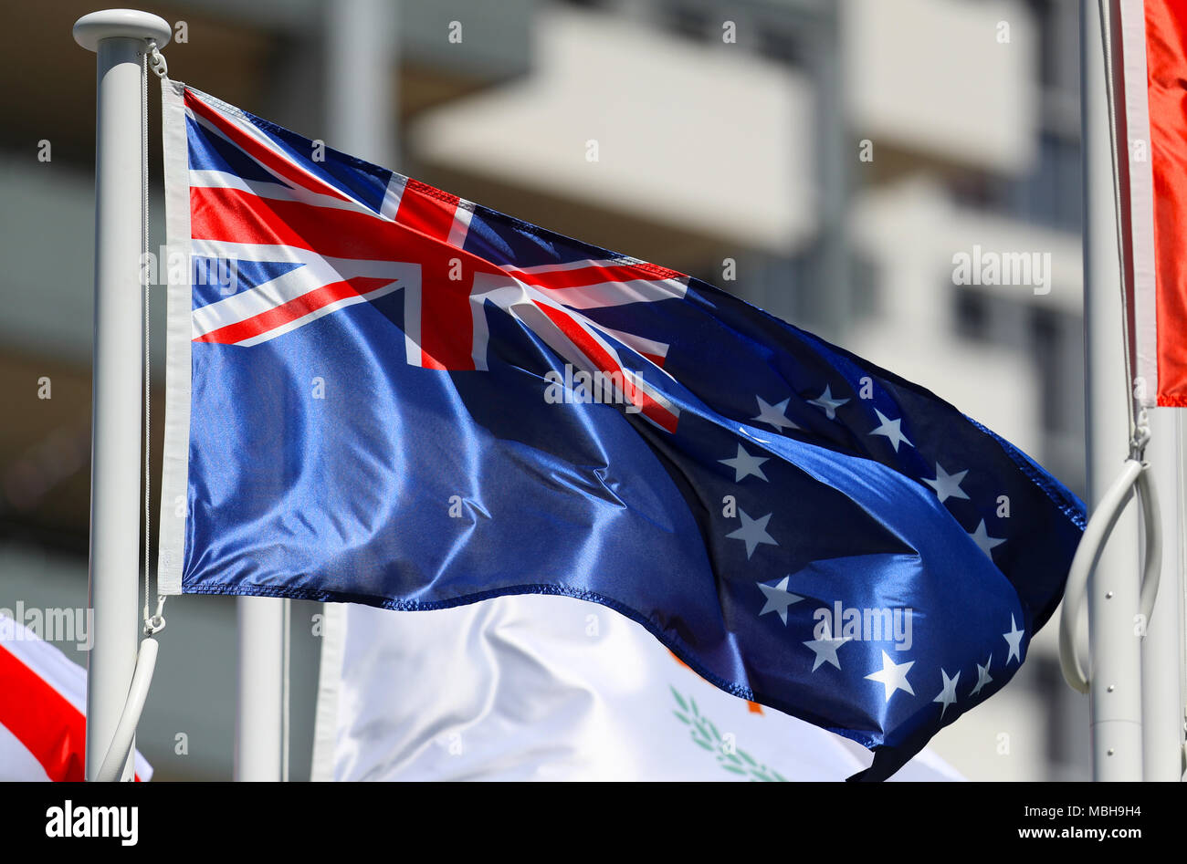 The flag of the Cook Islands on a pole at the Commonwealth Games Stock ...