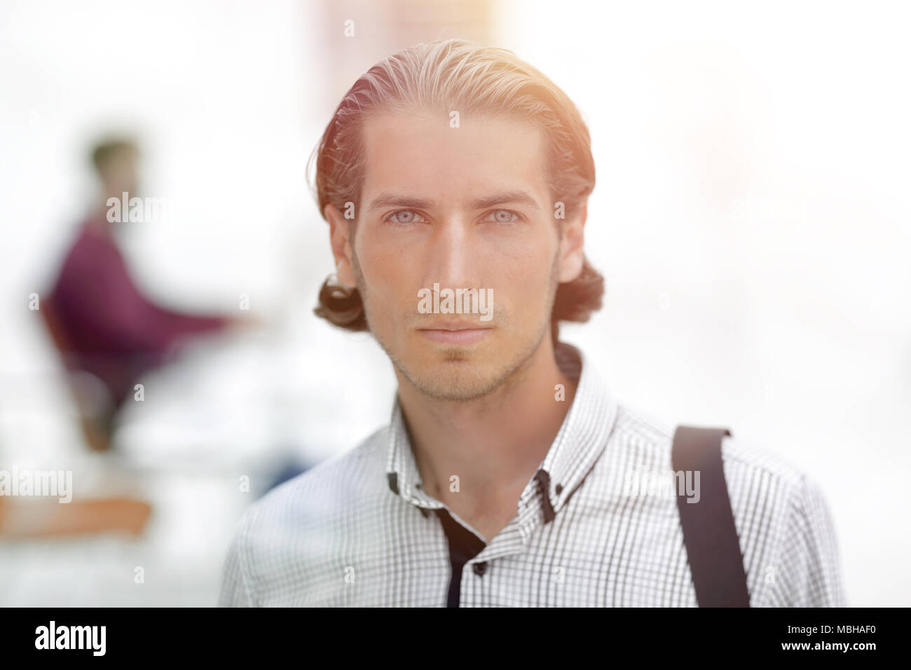 portrait of a successful man in the background of the office Stock ...