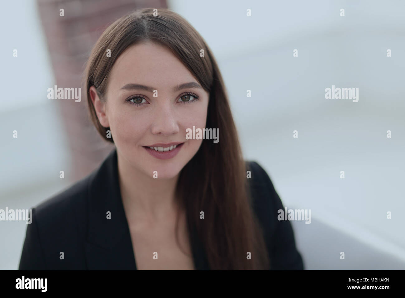 Face of beautiful woman on office background Stock Photo - Alamy