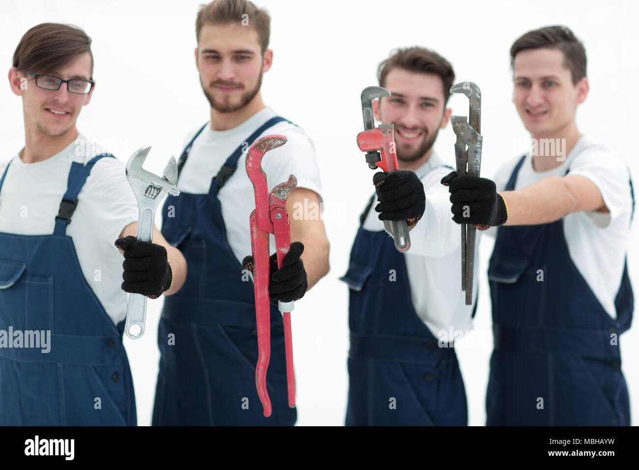 group of construction workers with working tools.isolated on white ...