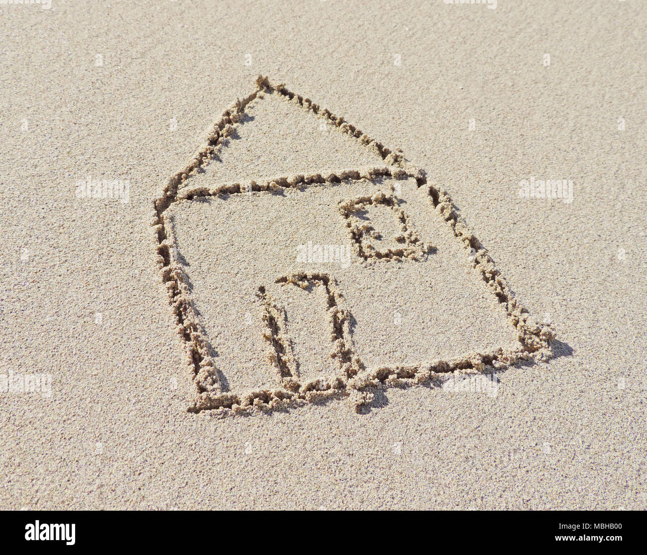 House drawing in the sand. Sand and sea scene with surf and house ...