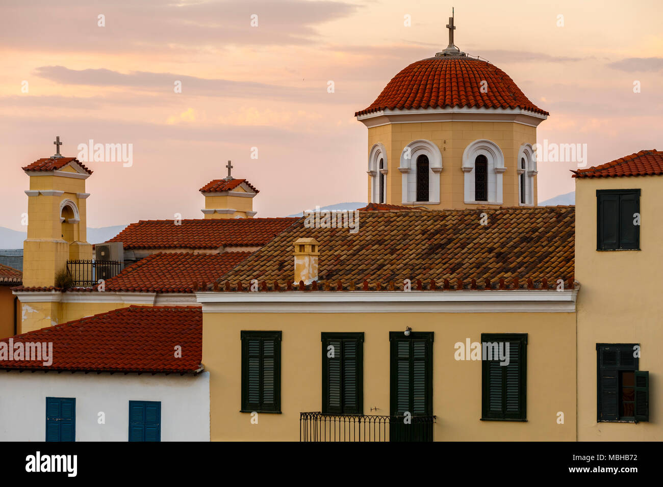 Church and neoclassical buildings in the old town of Athens, Greece ...
