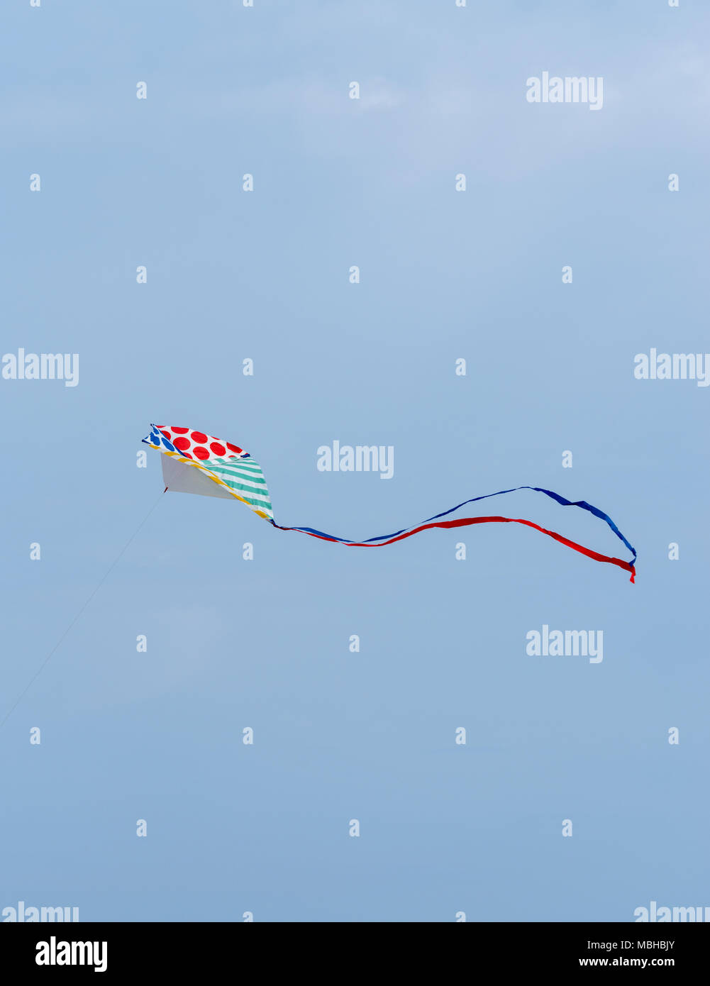 Low angle view of kite flying against clear sky Stock Photo - Alamy