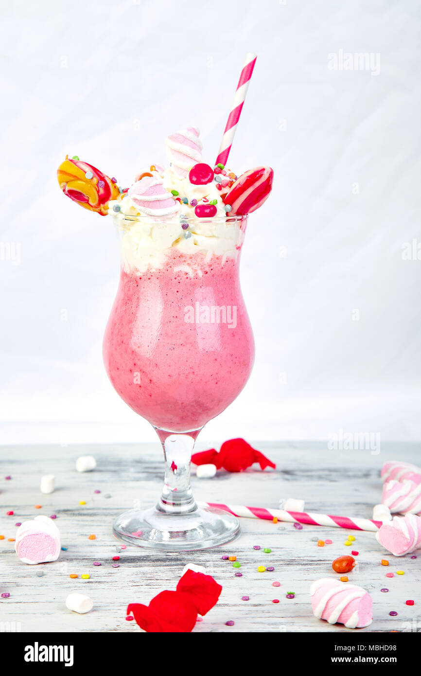 Pink Extreme milkshake with berry, rasberry, strawberry, candy ...