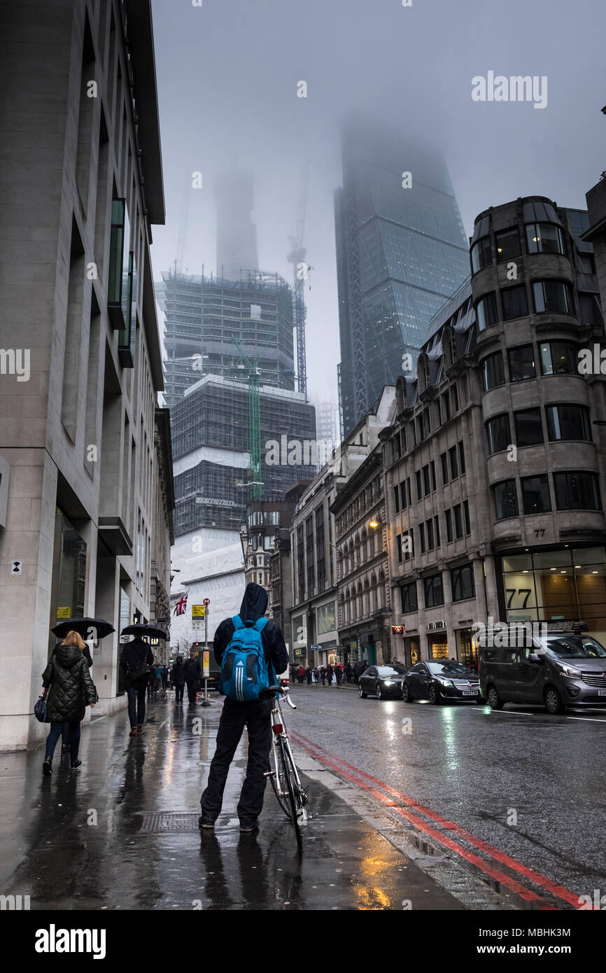 London, UK. 11th April 2018. UK Weather: Commuters make their way to ...