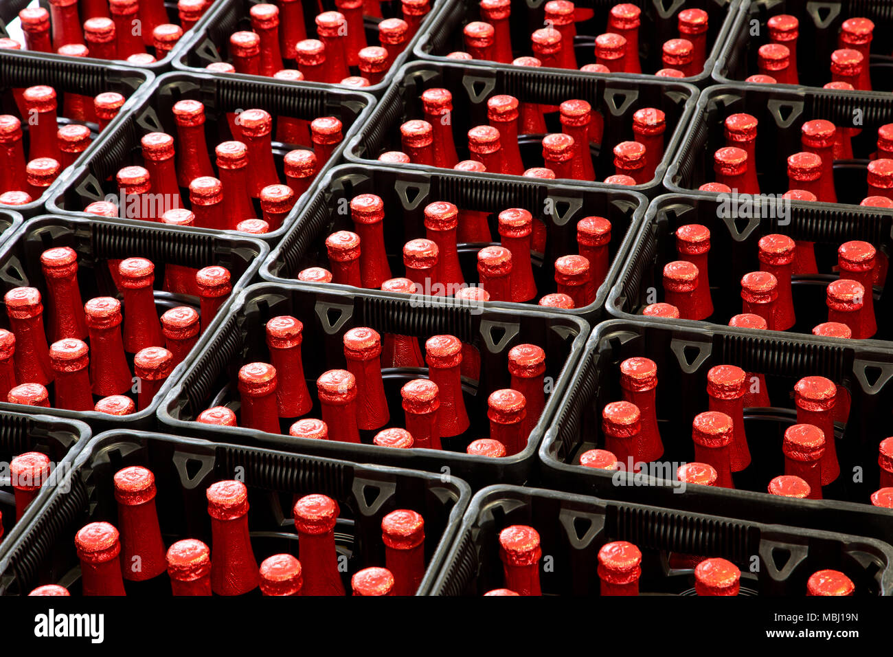 A group of red bottles in beer crates Stock Photo - Alamy