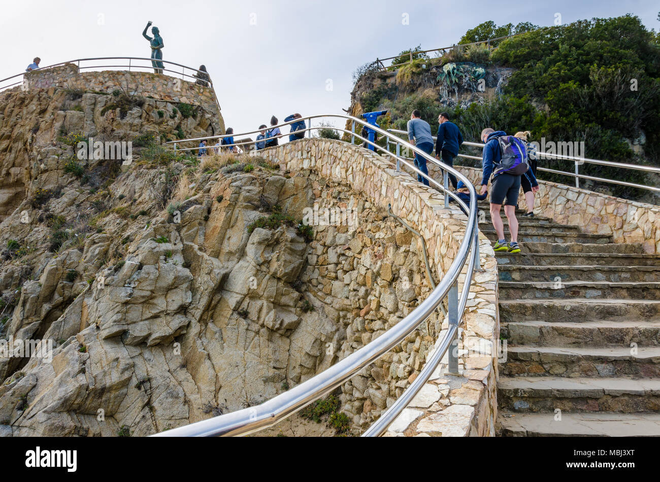 A winding staircase leads up to the top of the cliff to 'Dona Marinera ...