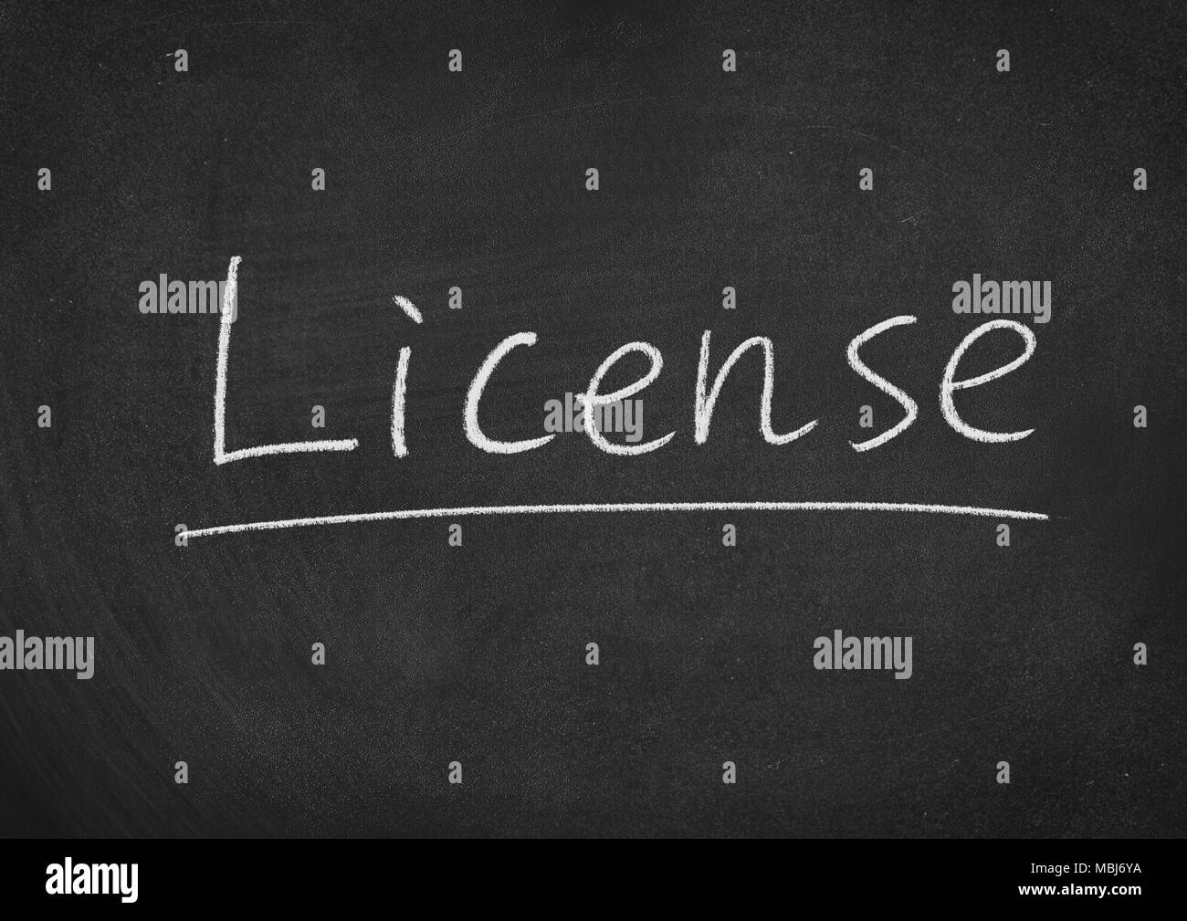 license concept word on a blackboard background Stock Photo - Alamy