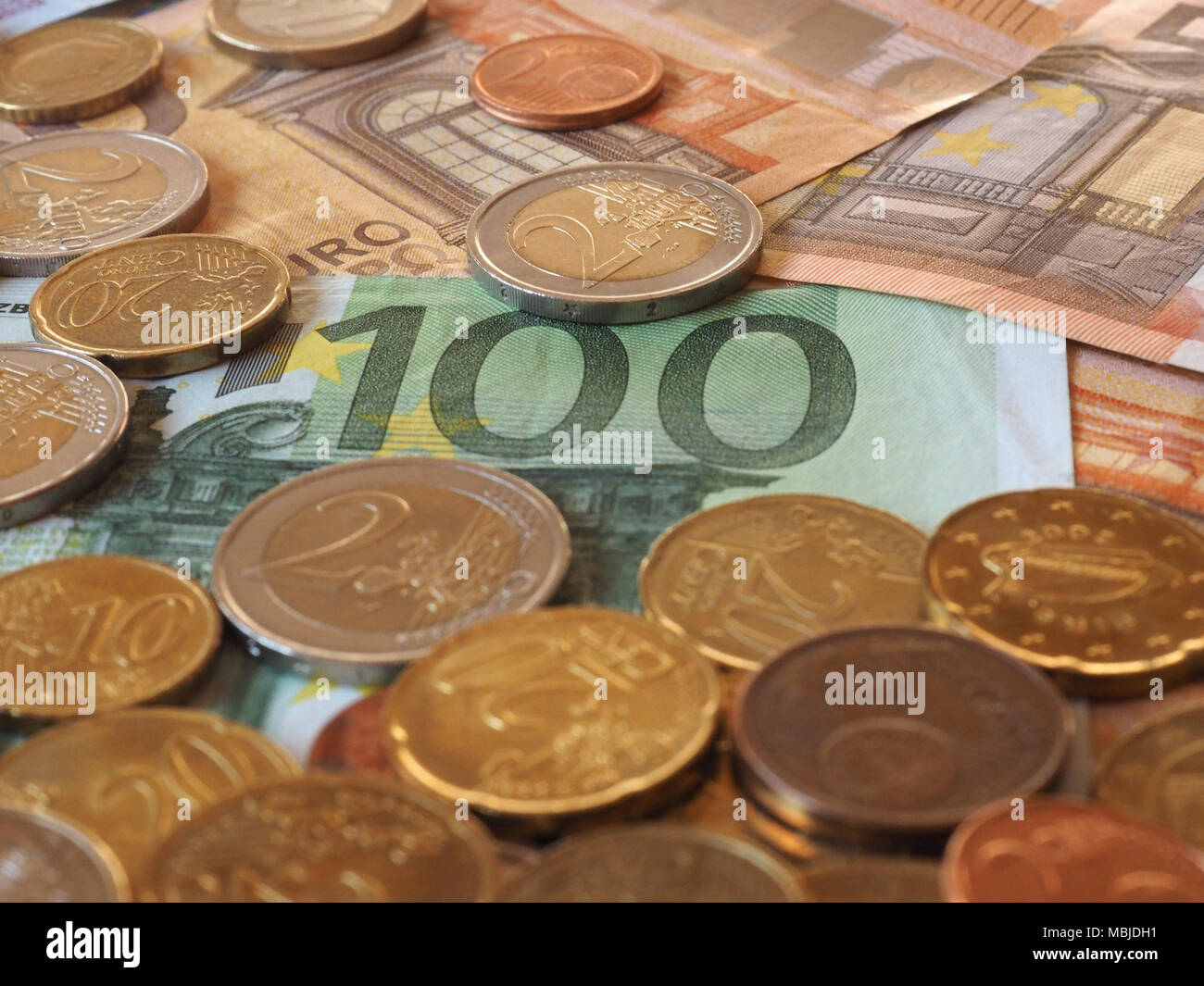Euro banknotes and coins (EUR), currency of European Union Stock Photo ...