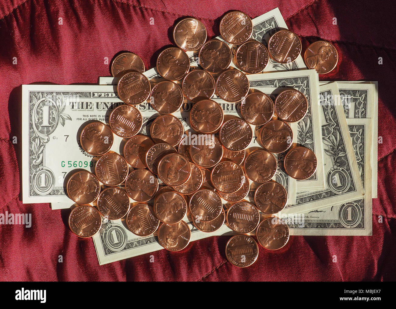 One Dollar banknotes and One Cent coin money (USD), currency of United ...