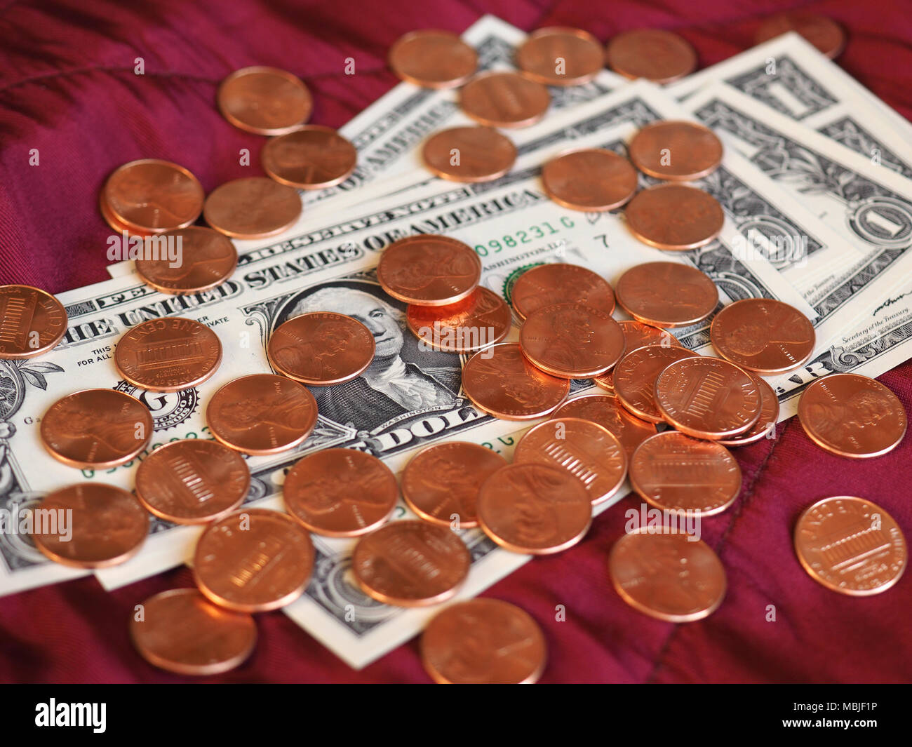 One Dollar banknotes and One Cent coin money (USD), currency of United ...