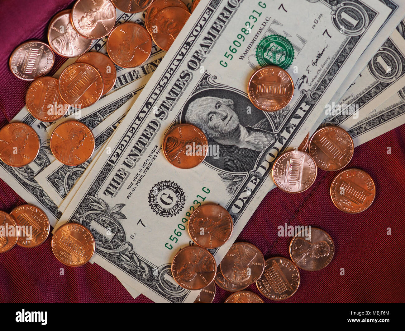 One Dollar banknotes and One Cent coin money (USD), currency of United ...