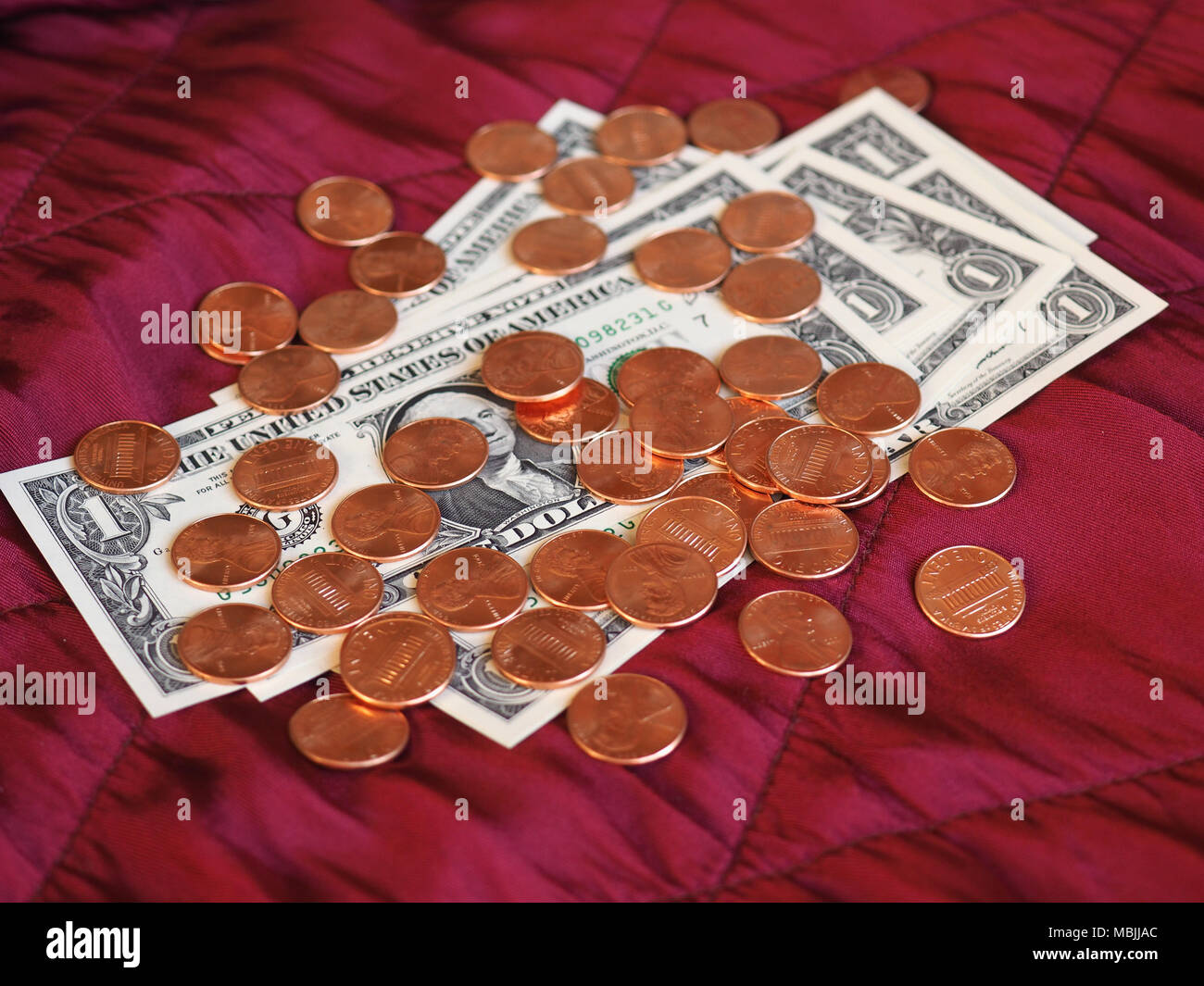 One Dollar banknotes and One Cent coin money (USD), currency of United ...