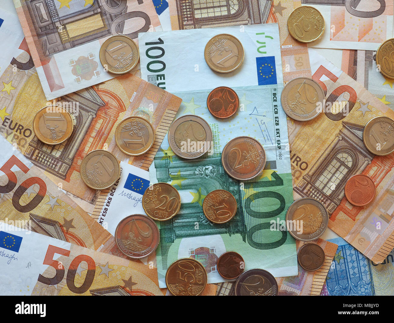 Euro banknotes and coins (EUR), currency of European Union Stock Photo ...