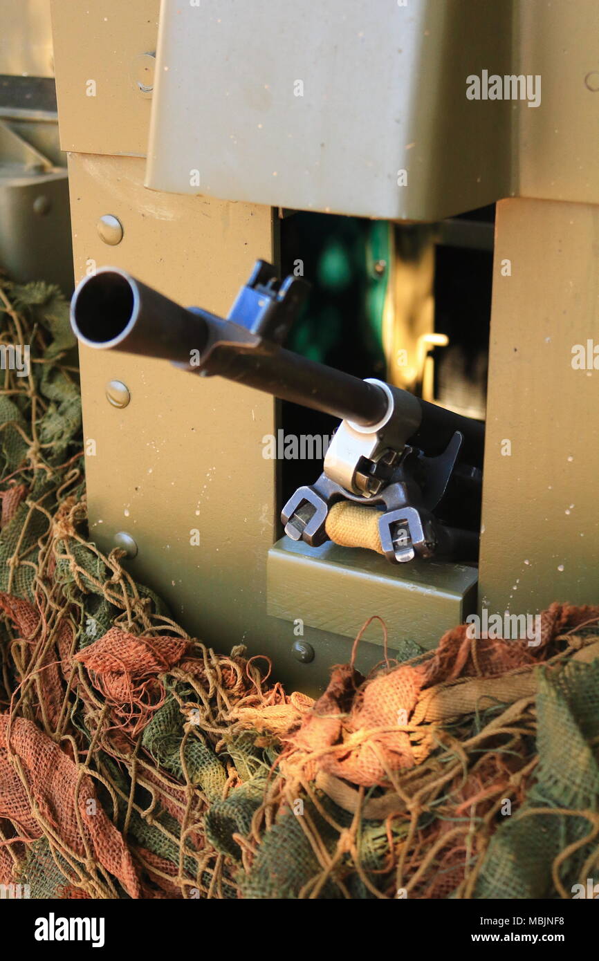 Machine gun protruding through armored vehicle portal Stock Photo - Alamy