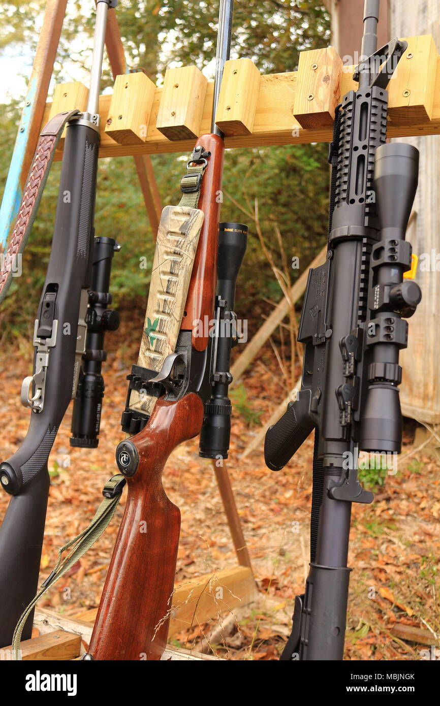 Rifles waiting to be sighted-in at an outdoor firing range Stock Photo ...