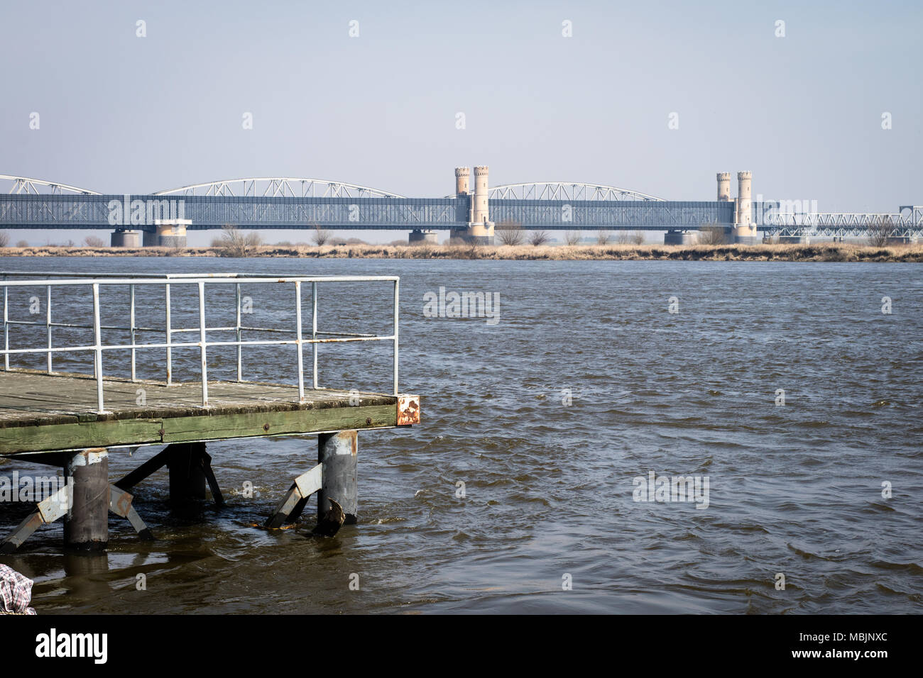 Bridge crossing across a large river. Truss bridge in the city of Tczew ...