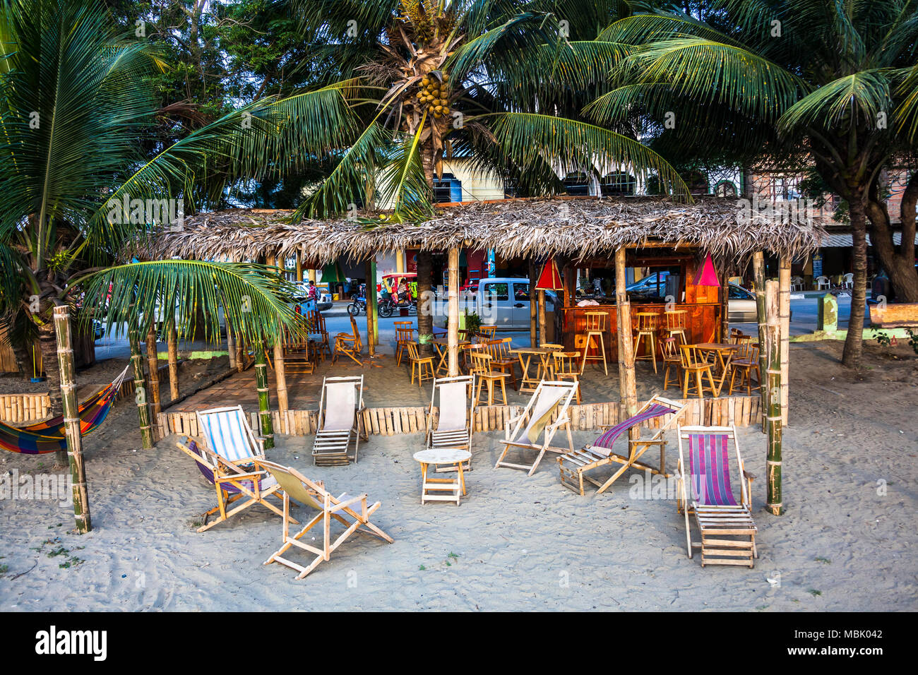 Bar on the beach under palm trees Stock Photo - Alamy