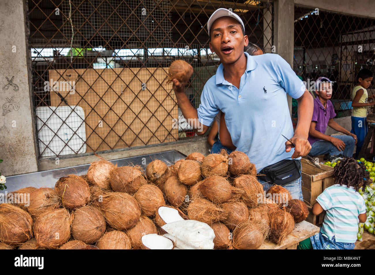 SANTO DOMINGO, ECUADOR - APRIL 15, 2010: Unidentified man selling ...