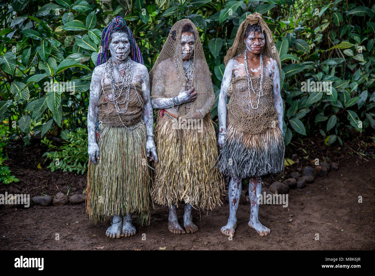 Portrait of three Huli widows at a "widows village", Tari Valley, Papua ...