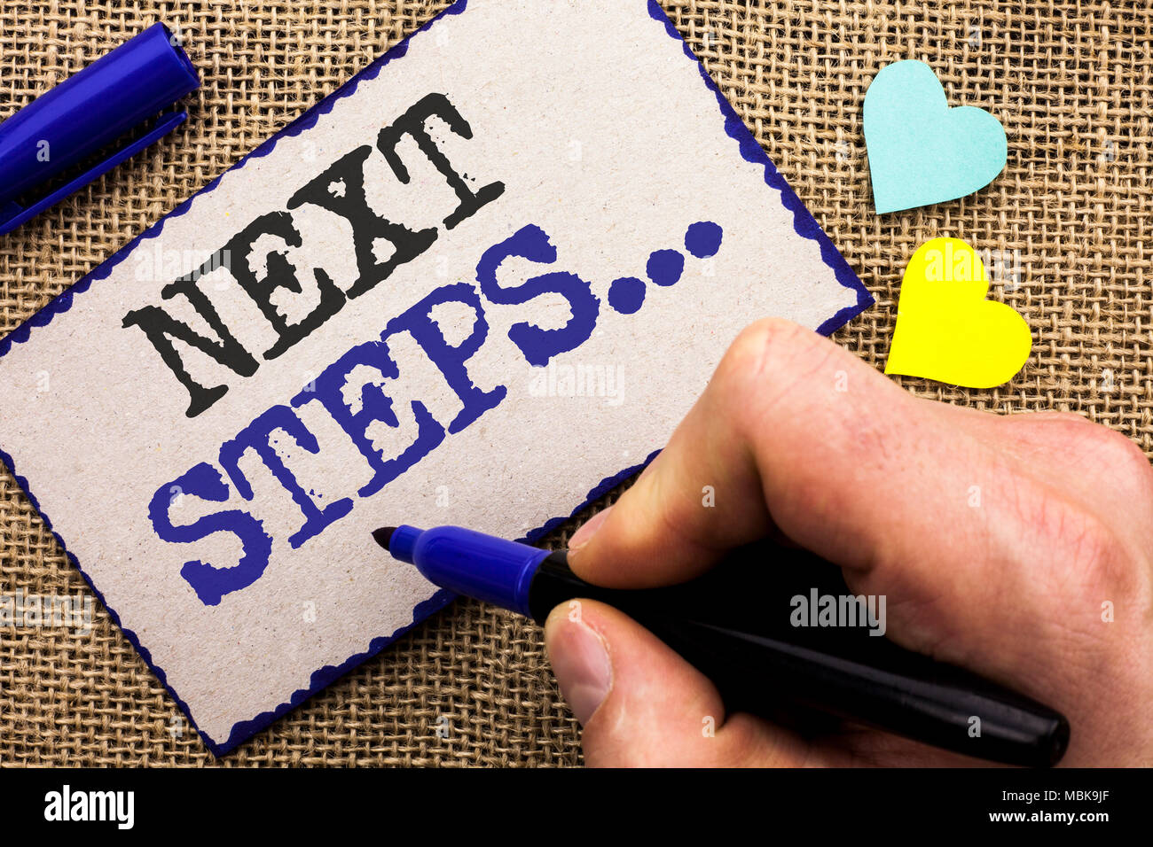 Conceptual hand writing showing Next Steps.... Business photo ...