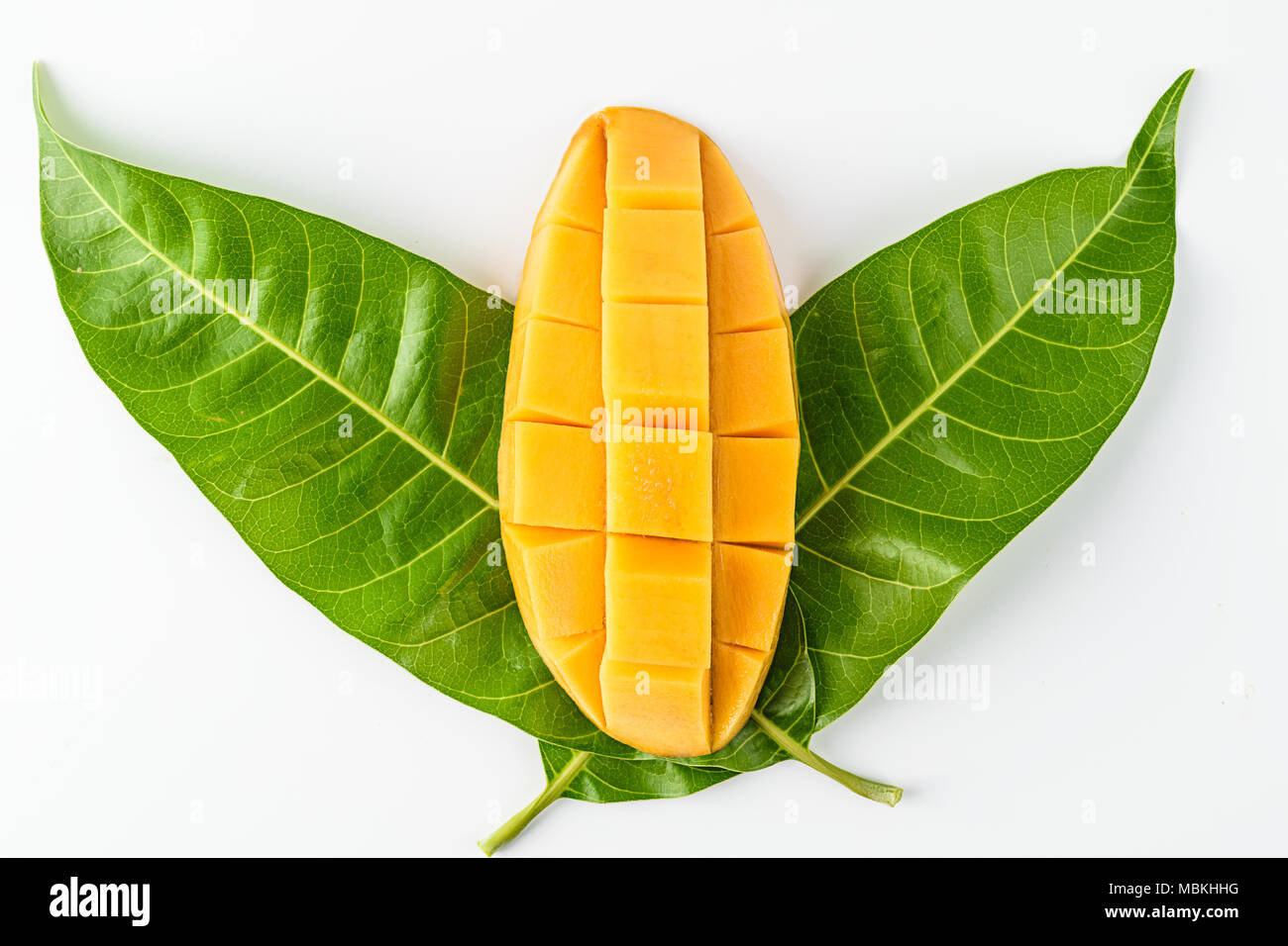 mango top on leaves top view isolated Stock Photo - Alamy
