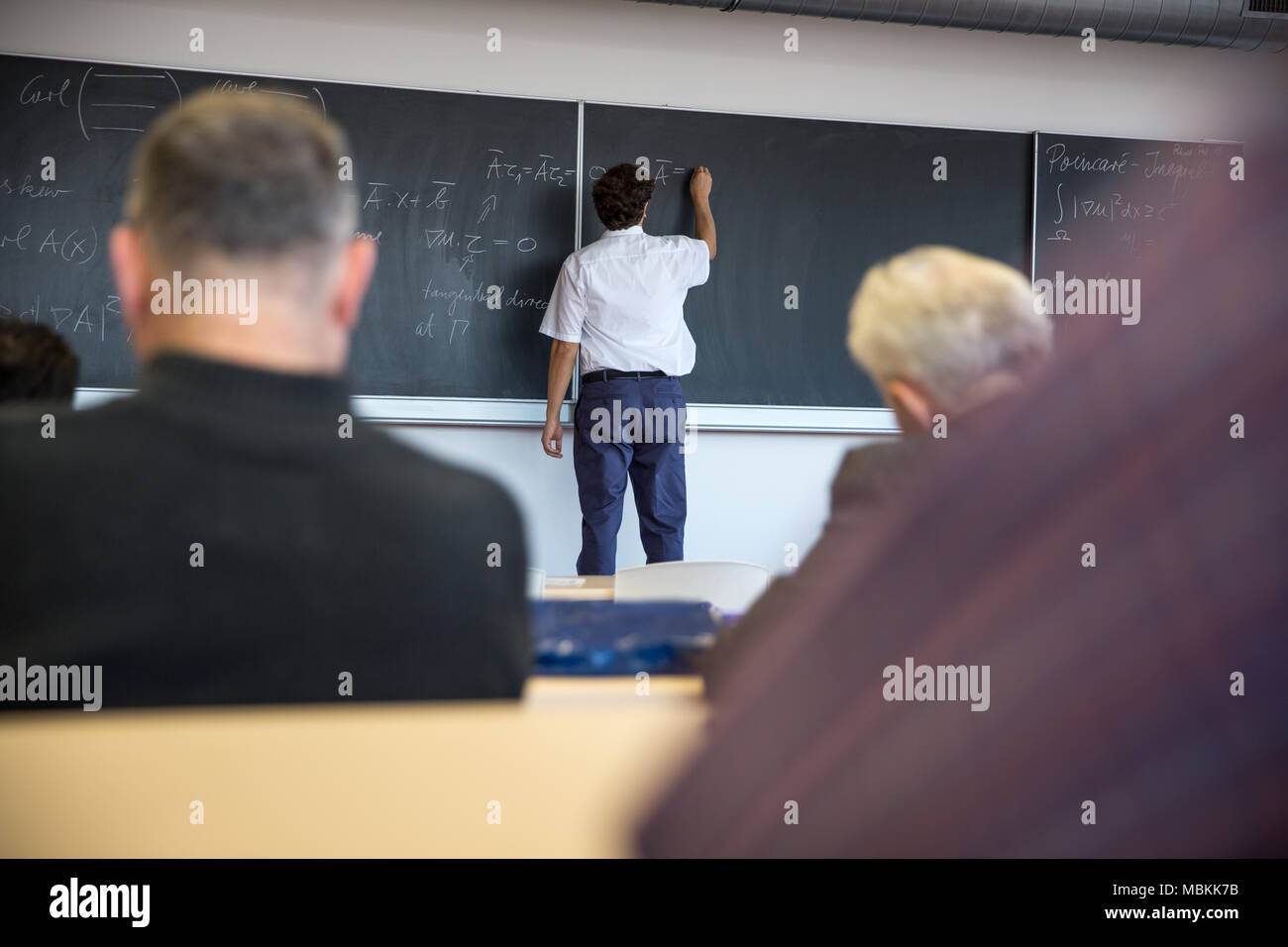 Professor blackboard explaining geometry hi-res stock photography and ...