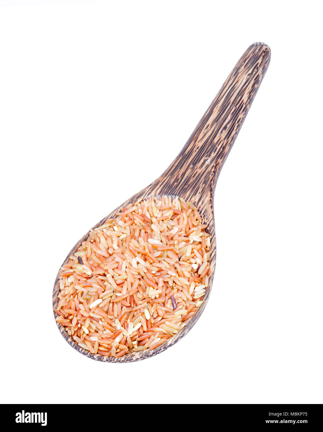 Organic Brown Rice (unpolished rice) on wooden ladle isolated on white ...