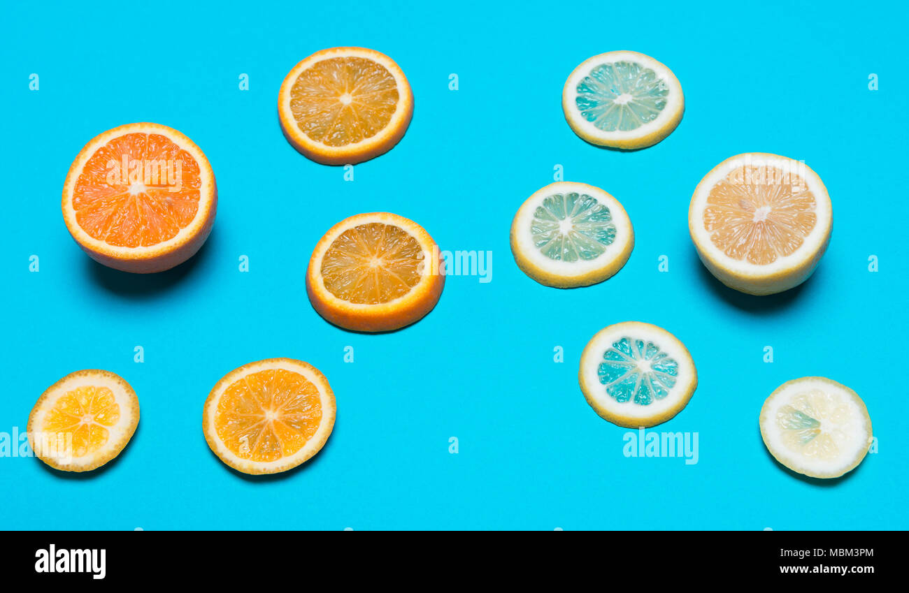 Halves of different fruit lying next to each other Stock Photo - Alamy