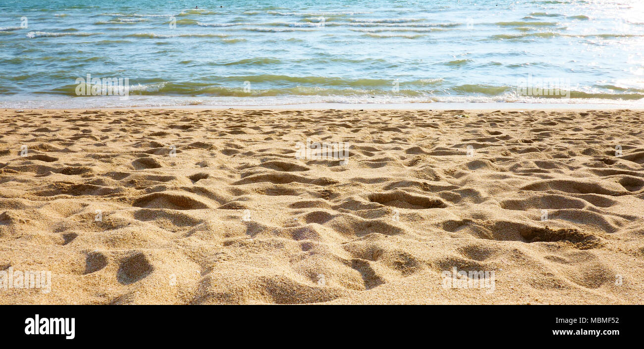 Beautiful sand beach with sea water Stock Photo - Alamy