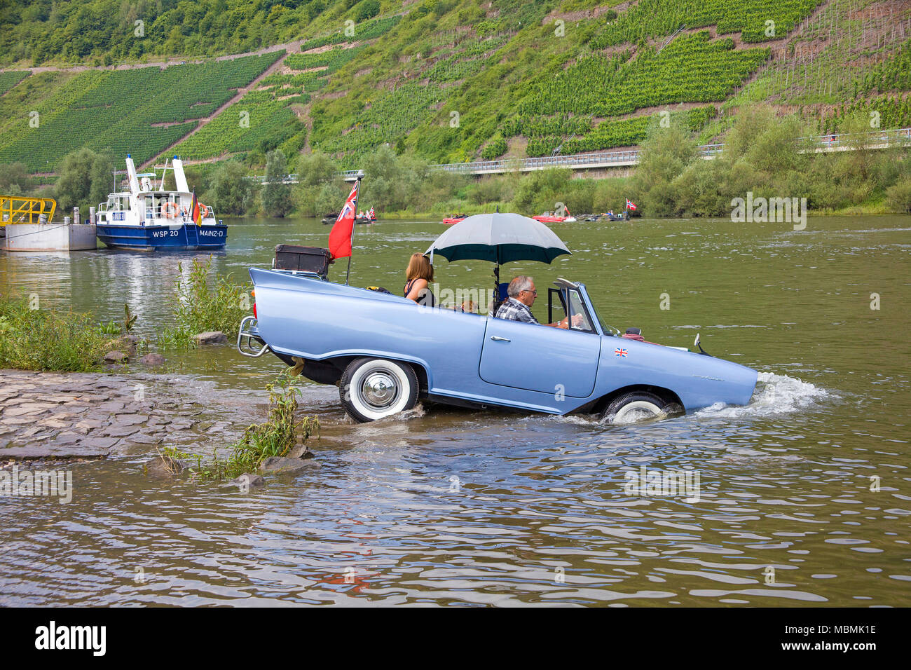 Amphic car, a german amphibious vehicle driving on Moselle at Cochem ...