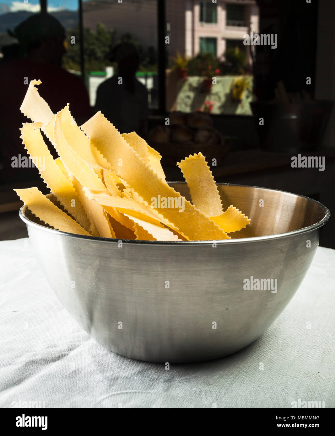 Fresh pasta in a metal pot Stock Photo - Alamy