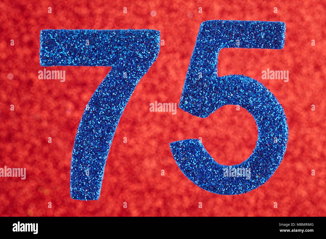 Number seventy-five blue color over a red background. Anniversary ...