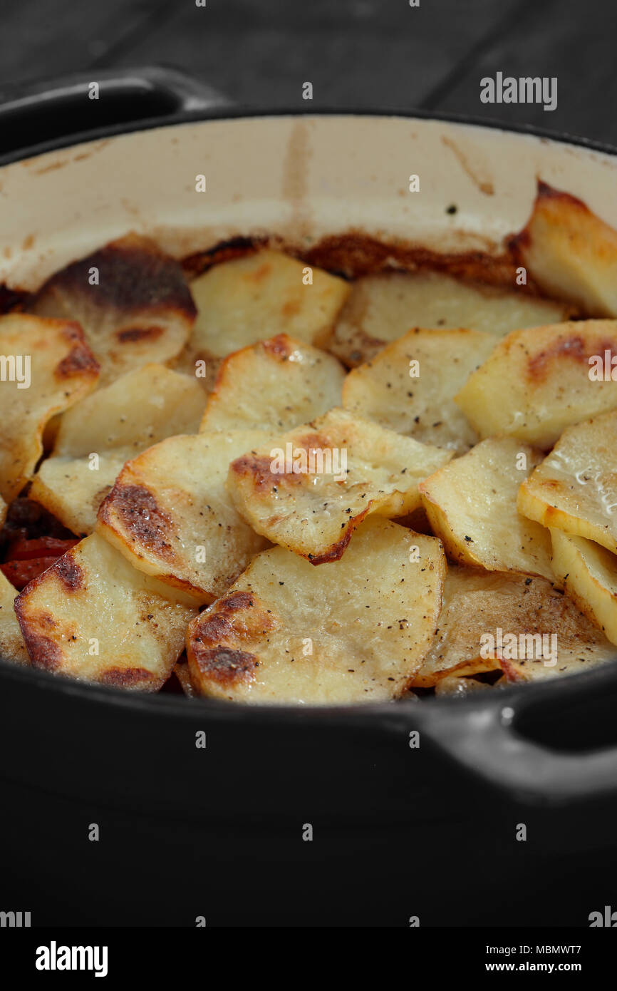 Potato hot pot in a ceramic dis with minced beef and vegetables ...