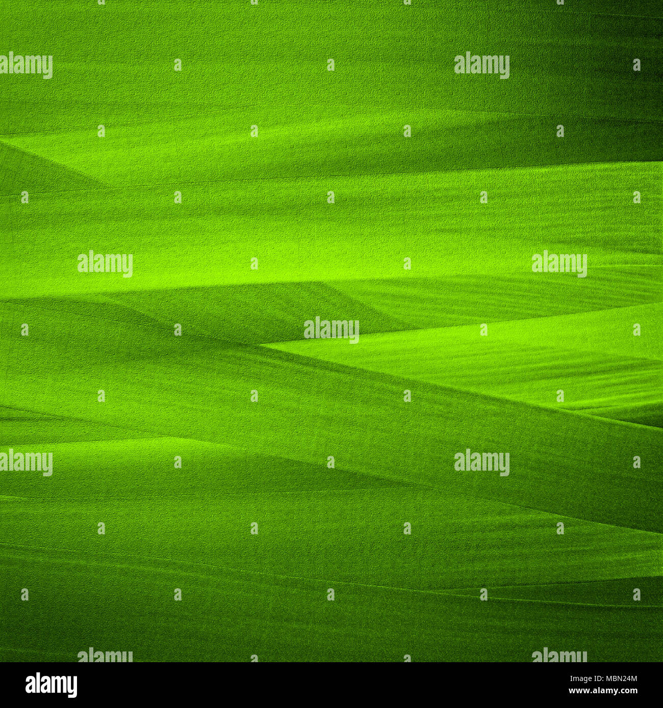 Light green background with overlapping fields of green Stock Photo - Alamy
