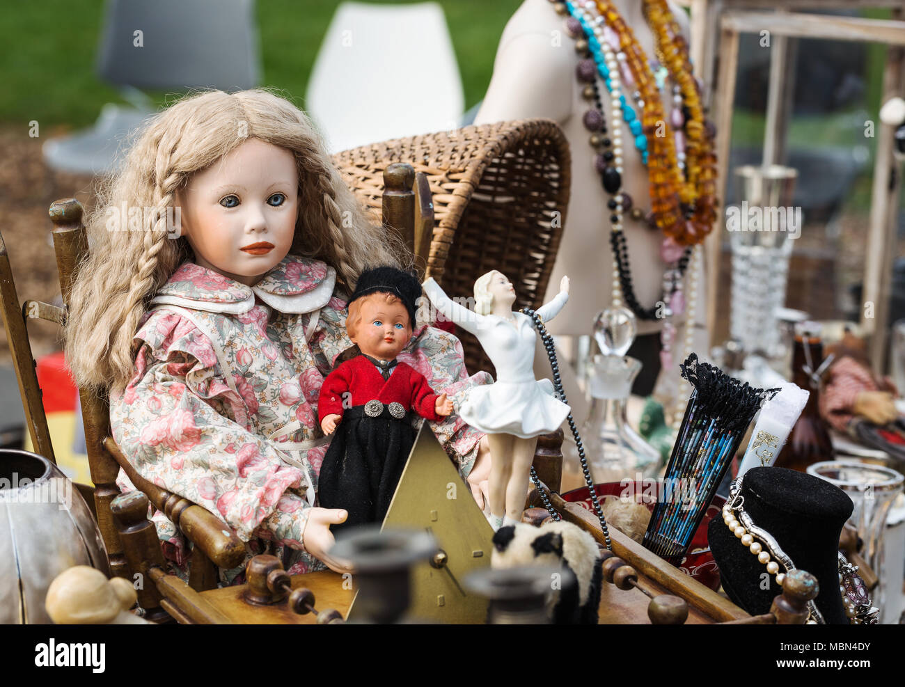 Flea market stall with doll Stock Photo - Alamy