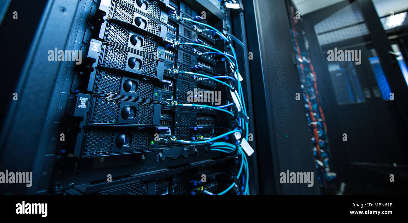 Network server room with servers/high performance computers running ... Network server room with servers/high performance computers running ...