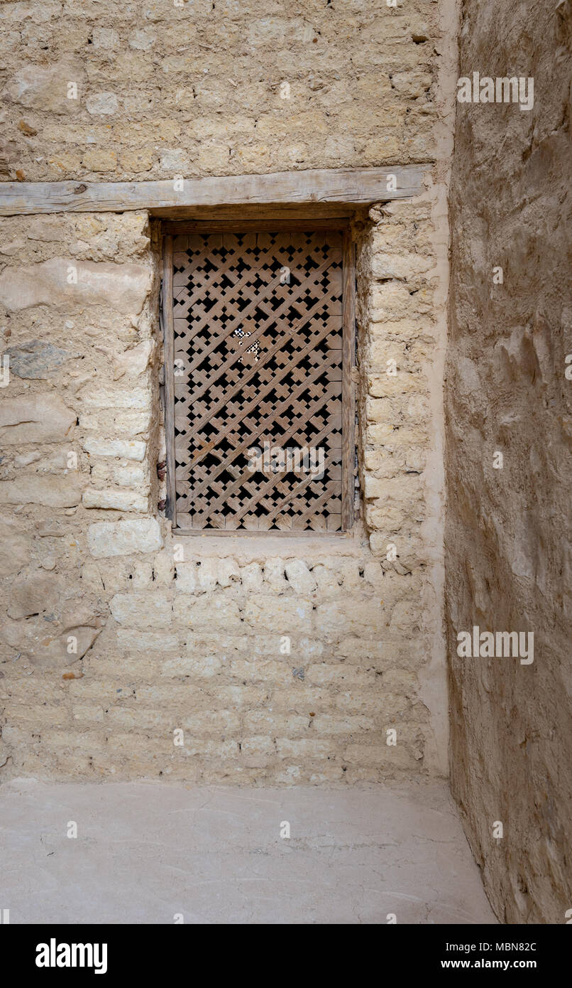 Ancient wooden window with geometrical pattern based on the christian ...